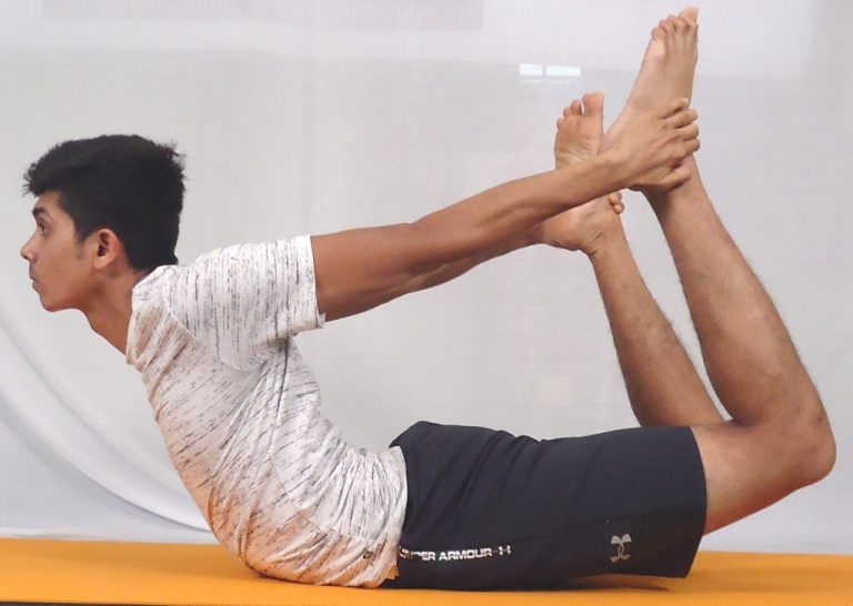 Dhanurasana(bow pose) - Karuna Yoga Vidya Peetham Bangalore